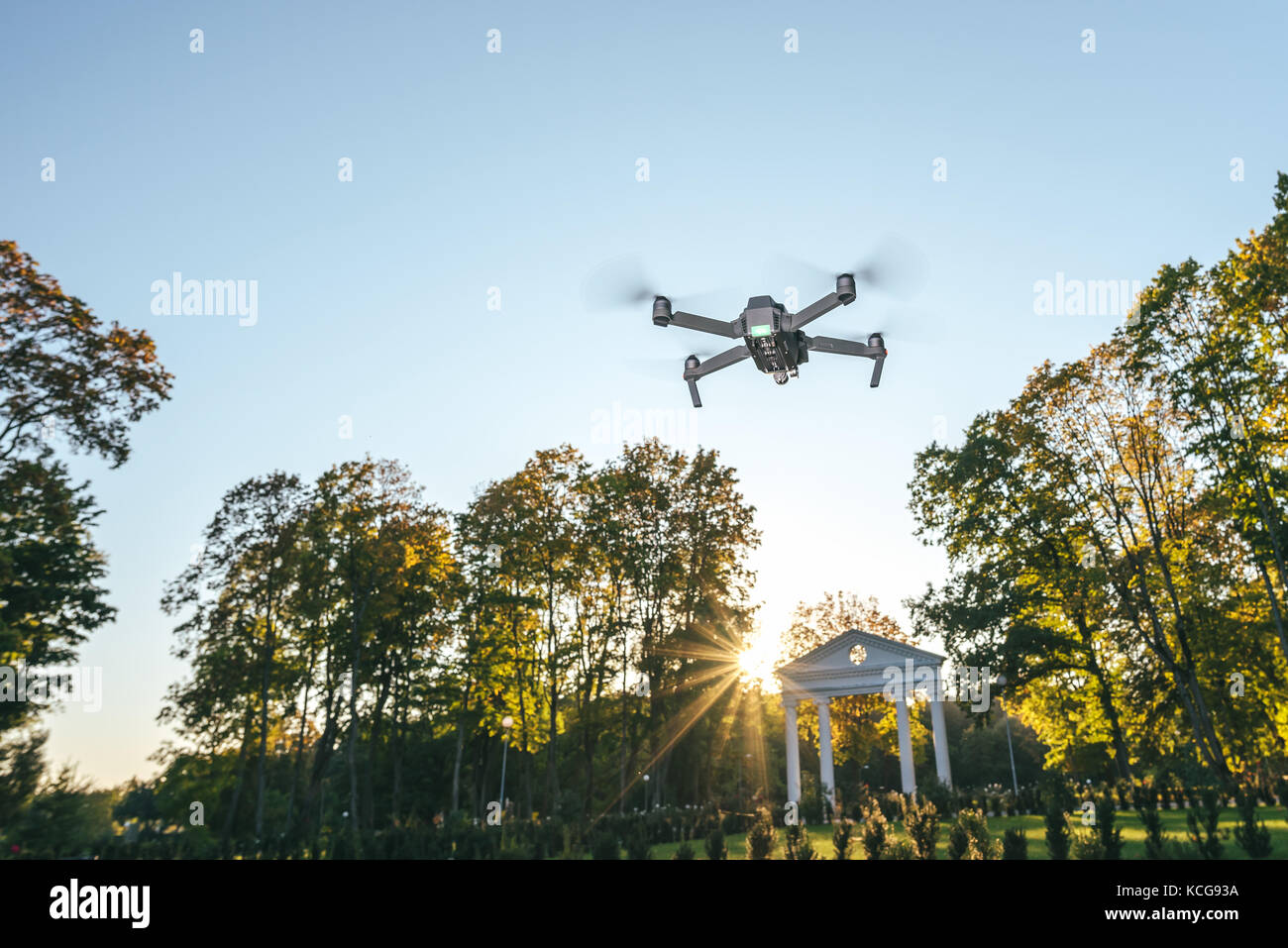 Drone on park background, sunset time Stock Photo - Alamy