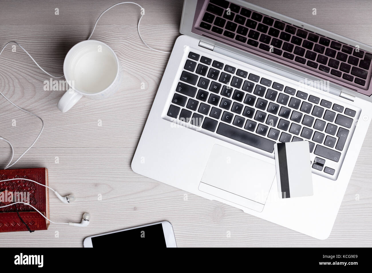 top view of mobile devices like a smartphone and a laptop during an ...