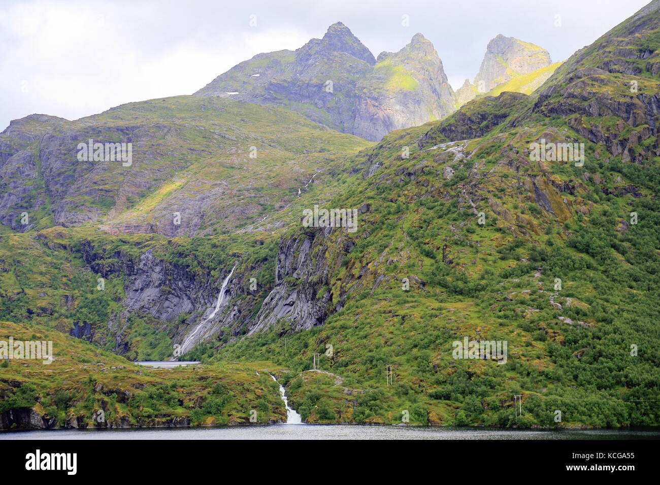 Panoramic views with waterfalls at hiking trail by Sorvagen, Lofoten ...