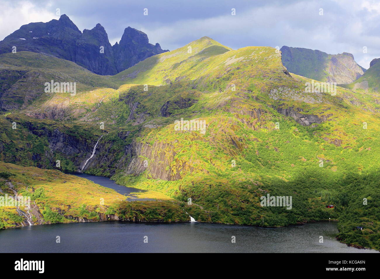 Panoramic views with waterfalls at hiking trail by Sorvagen, Lofoten ...