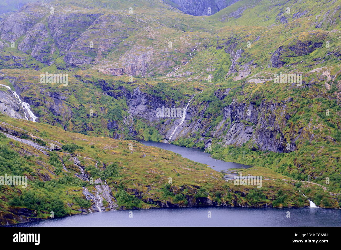 Panoramic views with waterfalls at hiking trail by Sorvagen, Lofoten ...
