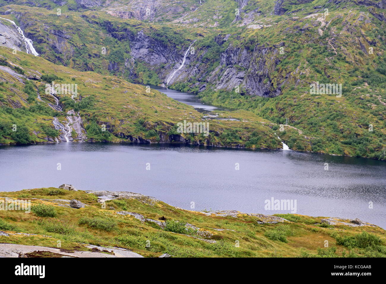 Panoramic views with waterfalls at hiking trail by Sorvagen, Lofoten ...