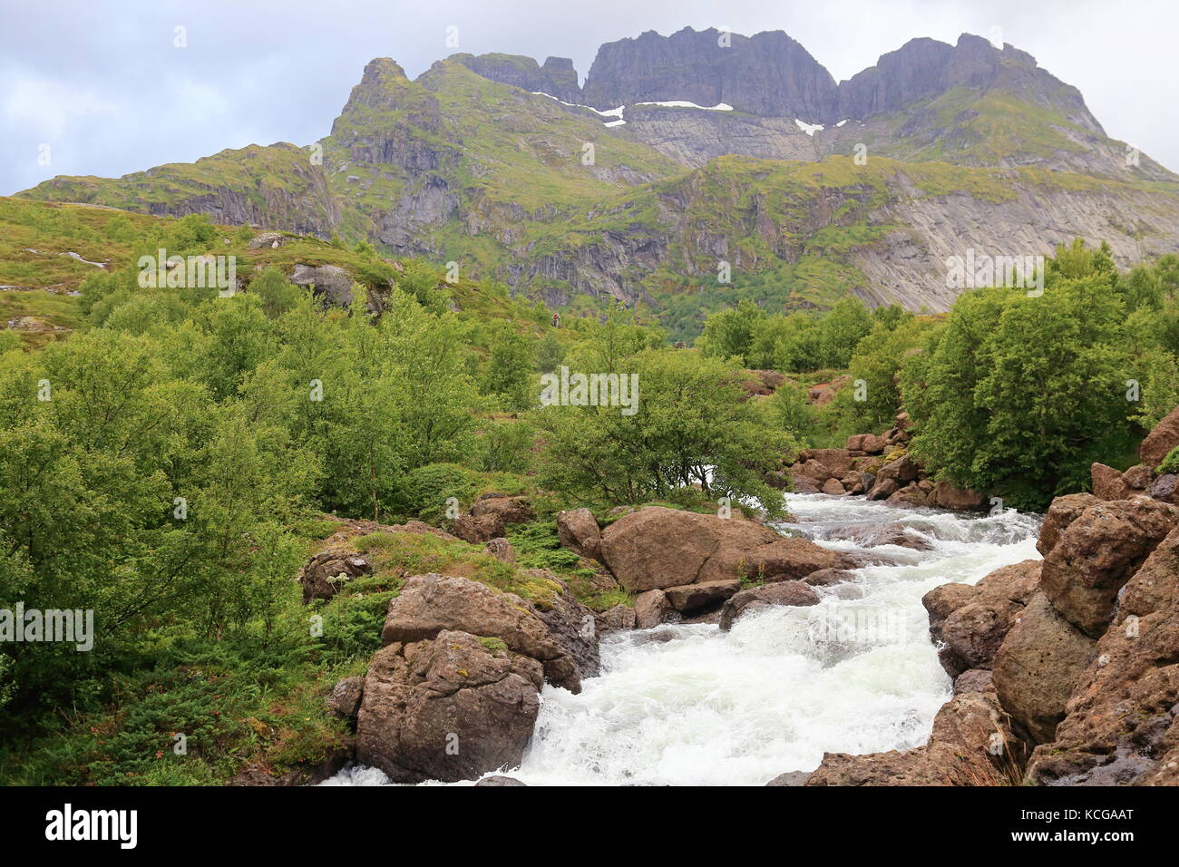 Panoramic views with waterfalls at hiking trail by Sorvagen, Lofoten ...
