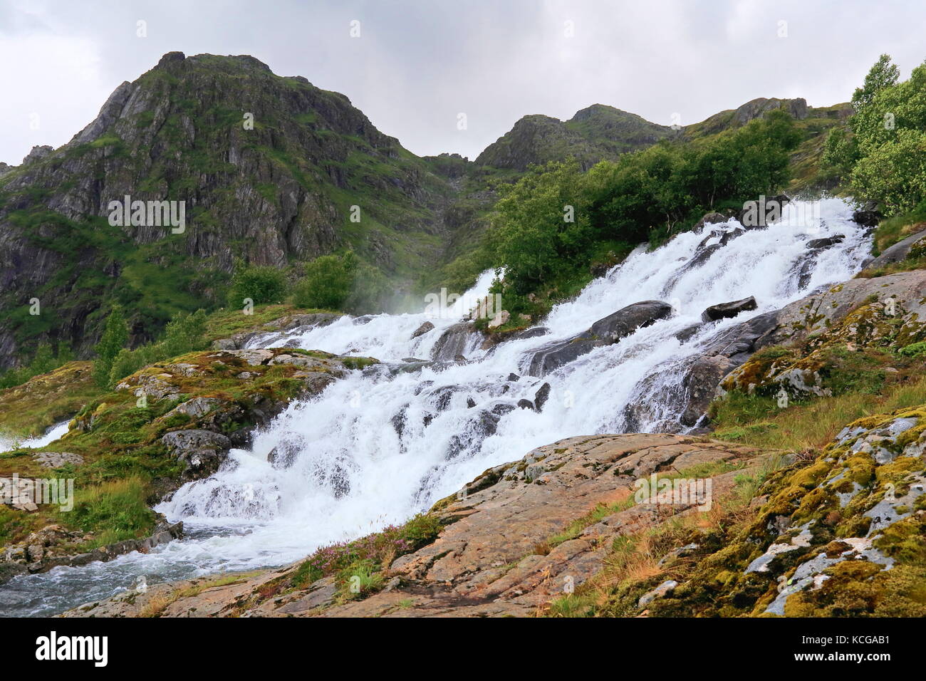 Panoramic views with waterfalls at hiking trail by Sorvagen, Lofoten ...