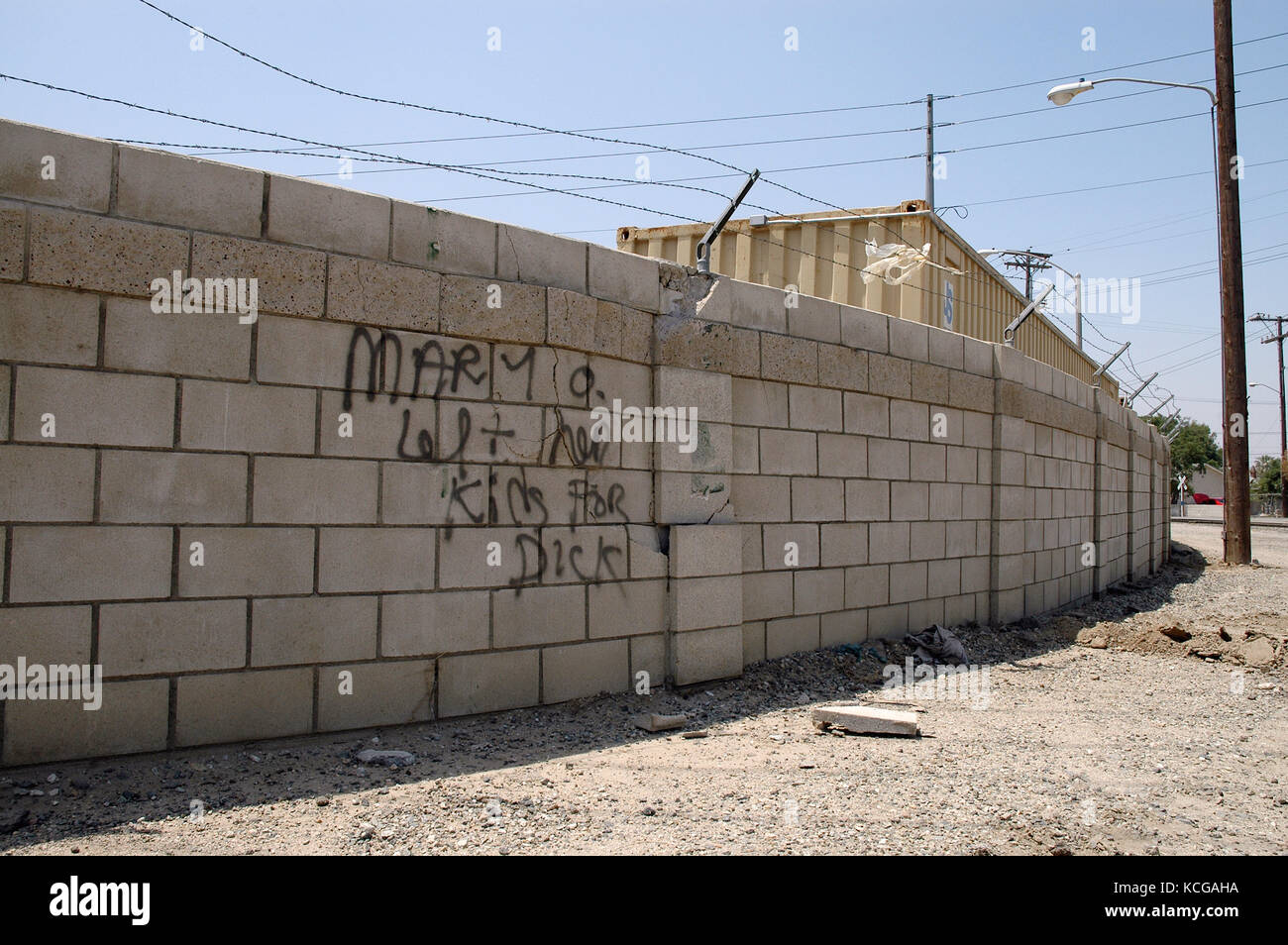 Graffiti message on a wall Stock Photo - Alamy