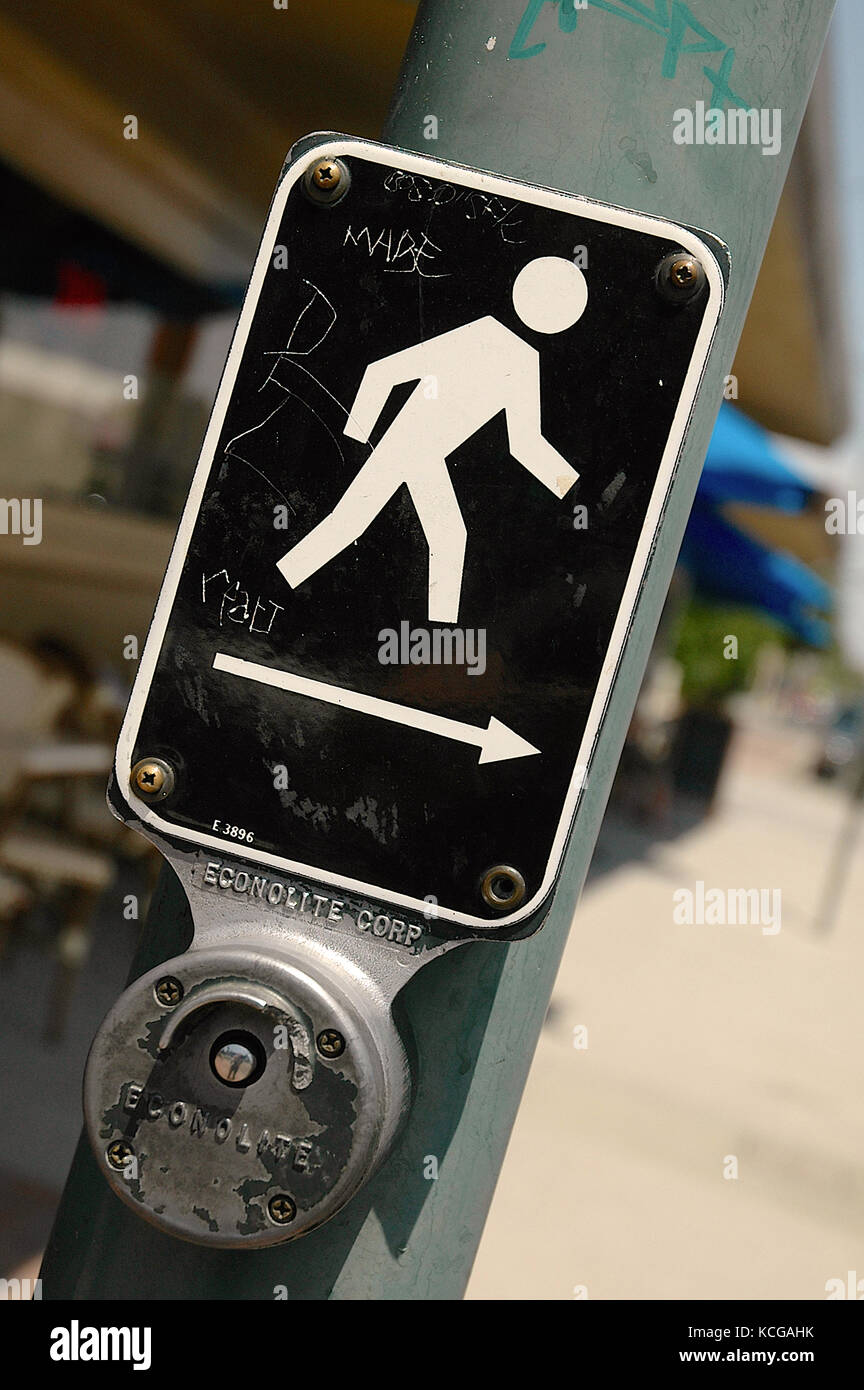 Pedestrian walk sign on a pole Stock Photo - Alamy
