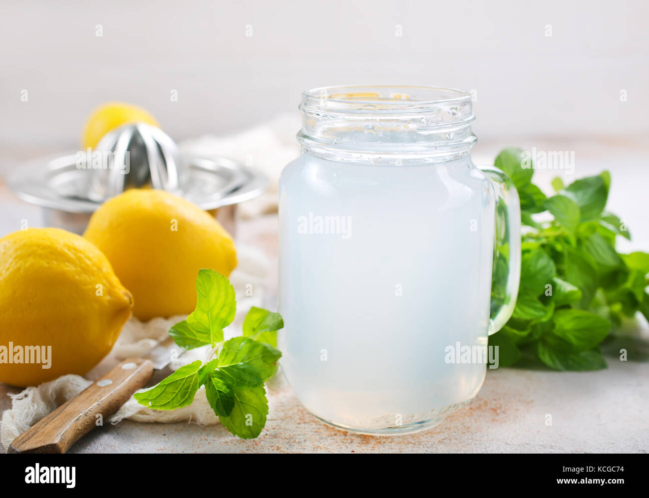 lemon juice in glass and on a table Stock Photo - Alamy
