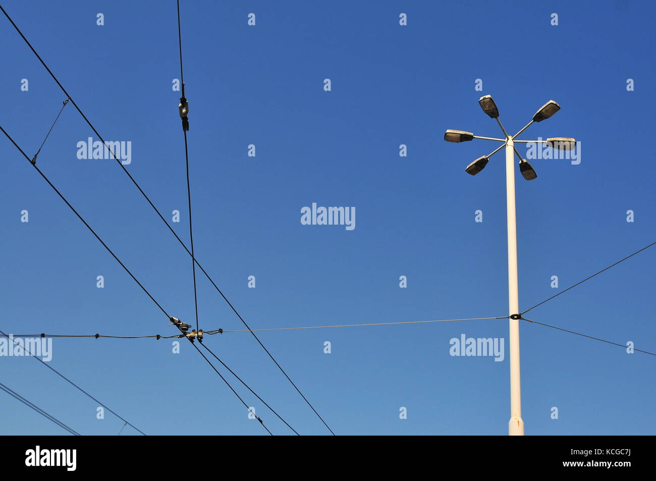 Street light on blue sky background with many wires Stock Photo - Alamy