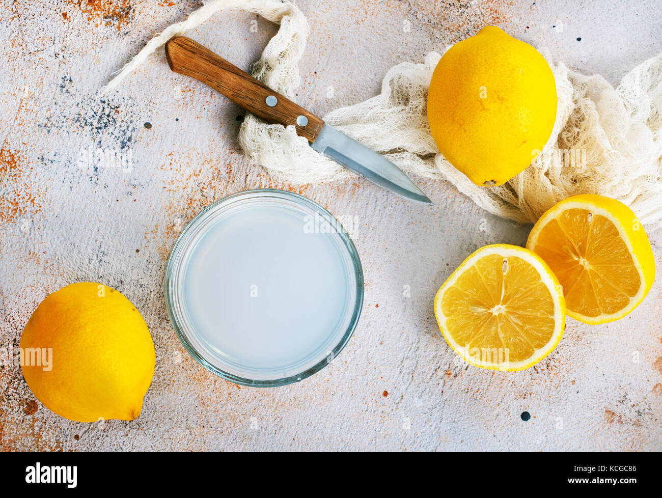 lemon juice in glass and on a table Stock Photo - Alamy