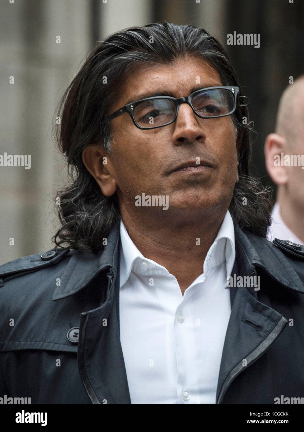 Asif aziz leaves royal courts justice hi-res stock photography and ...