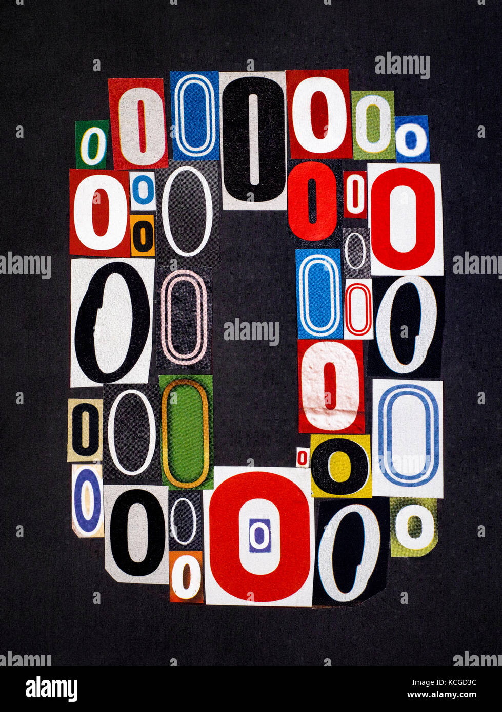 Number Zero made from numbers cutting from magazines on black ...