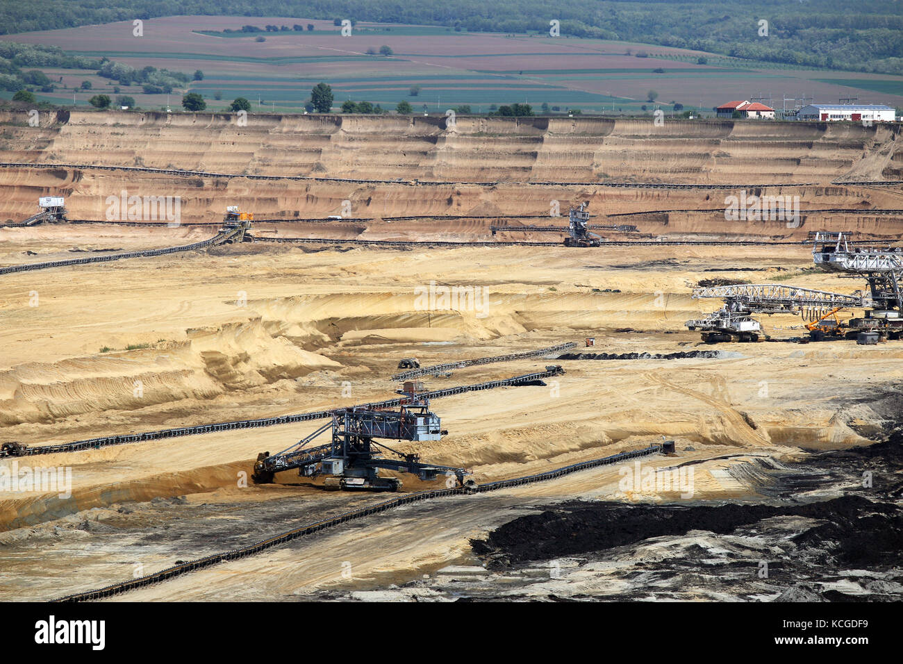open pit coal mine with machinery and excavators Stock Photo - Alamy