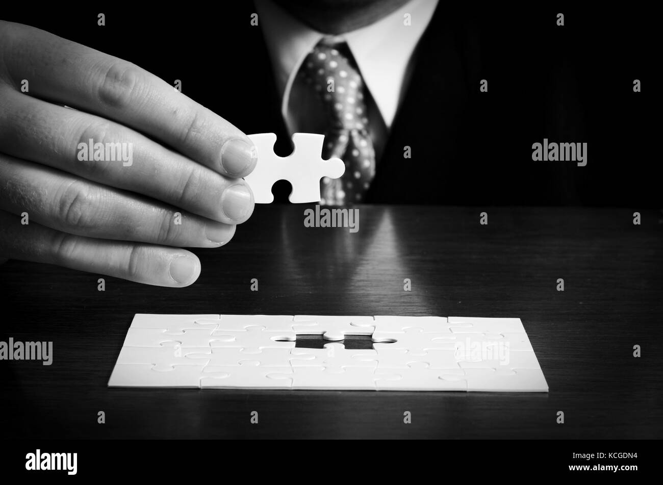 Man jigsaw puzzle Black and White Stock Photos & Images - Alamy