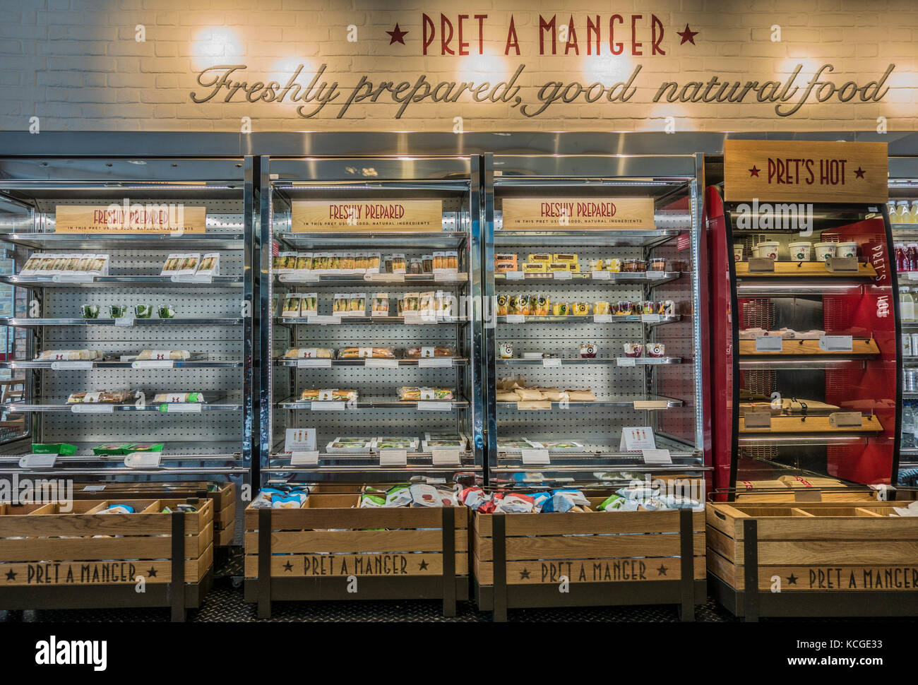 Fresh sandwiches in coolers, packets of crisps in boxes and hot food ...