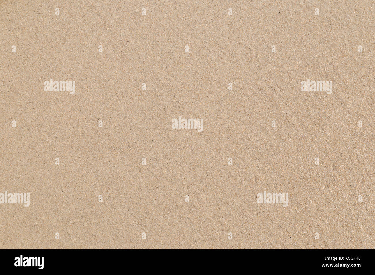 Close-up of smooth sand at a beach texture background Stock Photo - Alamy