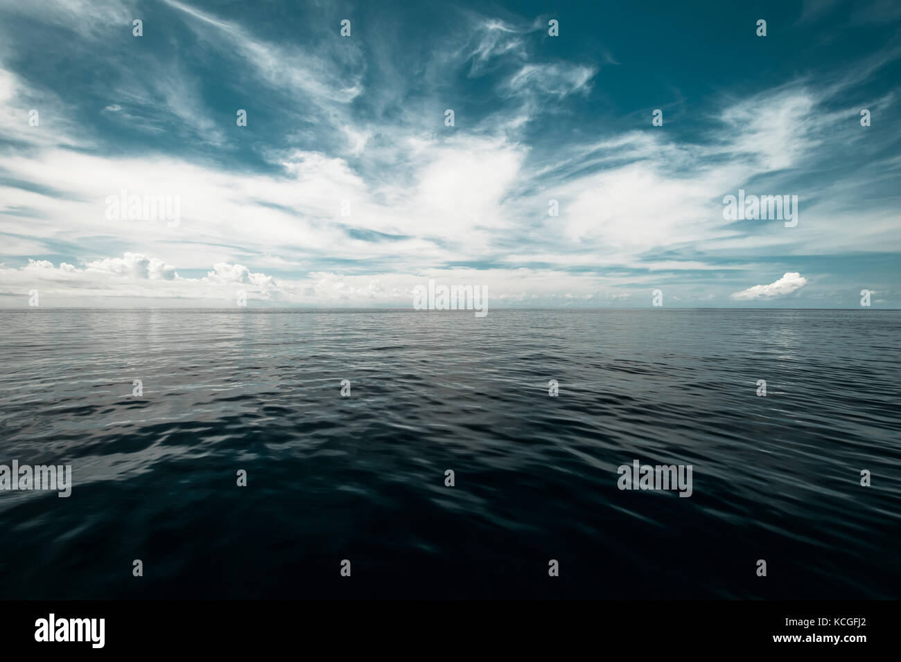 Open ocean and cloudy sky Stock Photo - Alamy