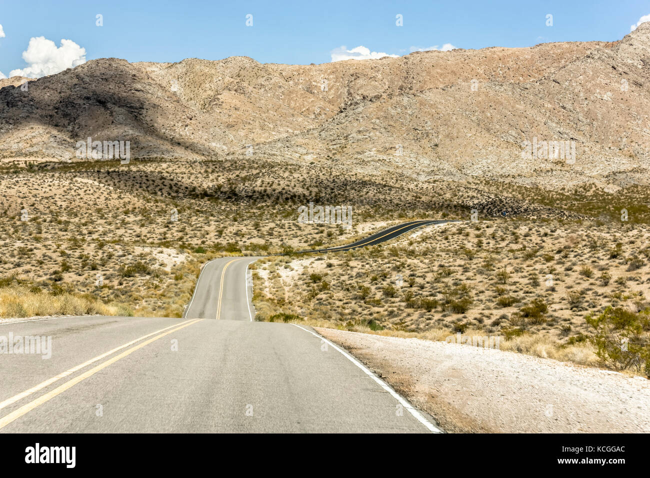 Paved road through mountains hi-res stock photography and images - Alamy