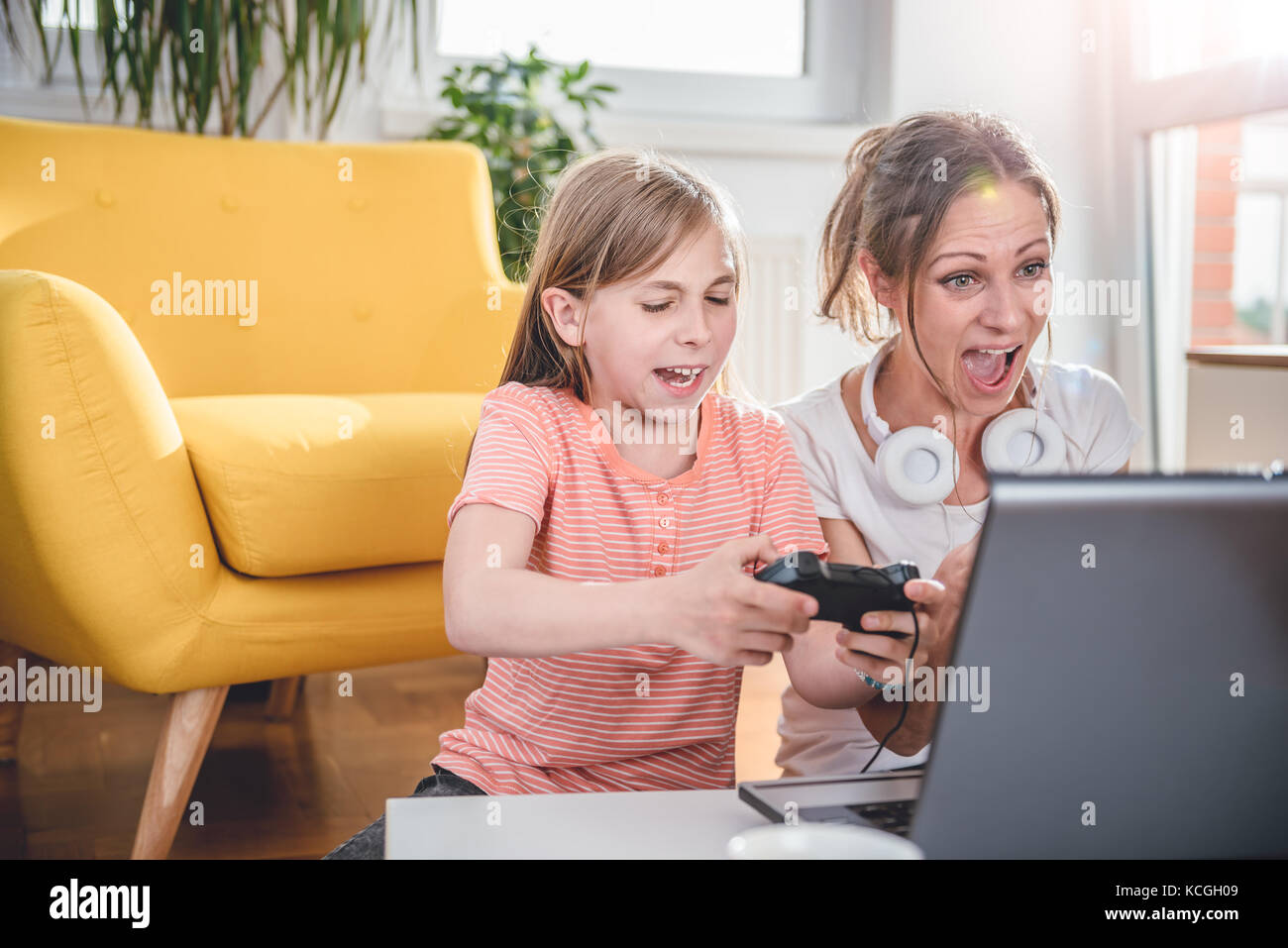Family playing computer games on hi-res stock photography and images ...