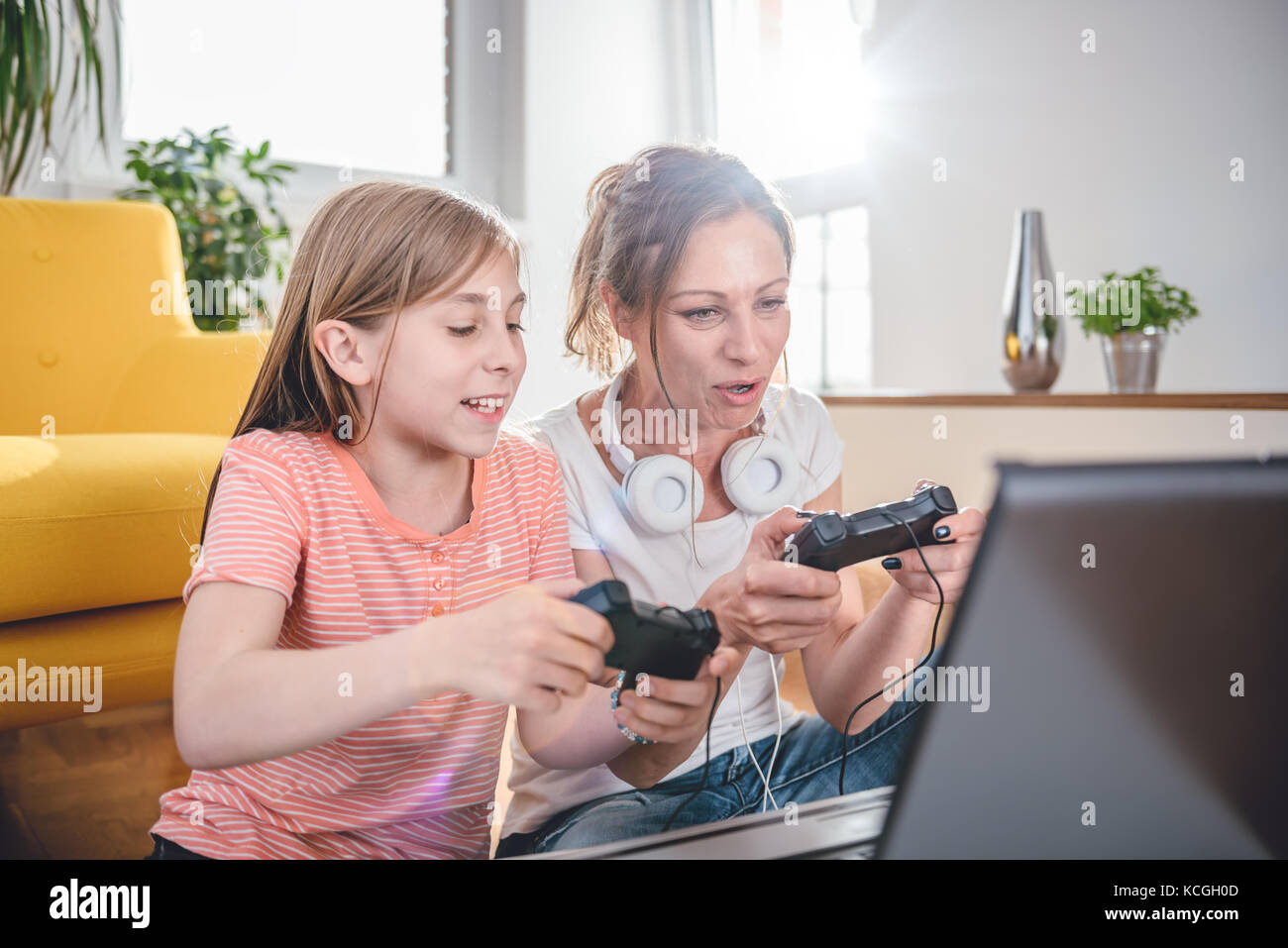 Gamer using joystick playing video hi-res stock photography and images ...