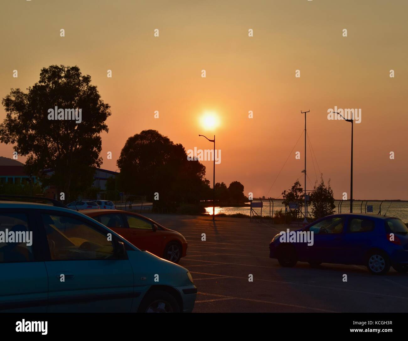 Sunset in the Parking Lot Stock Photo - Alamy