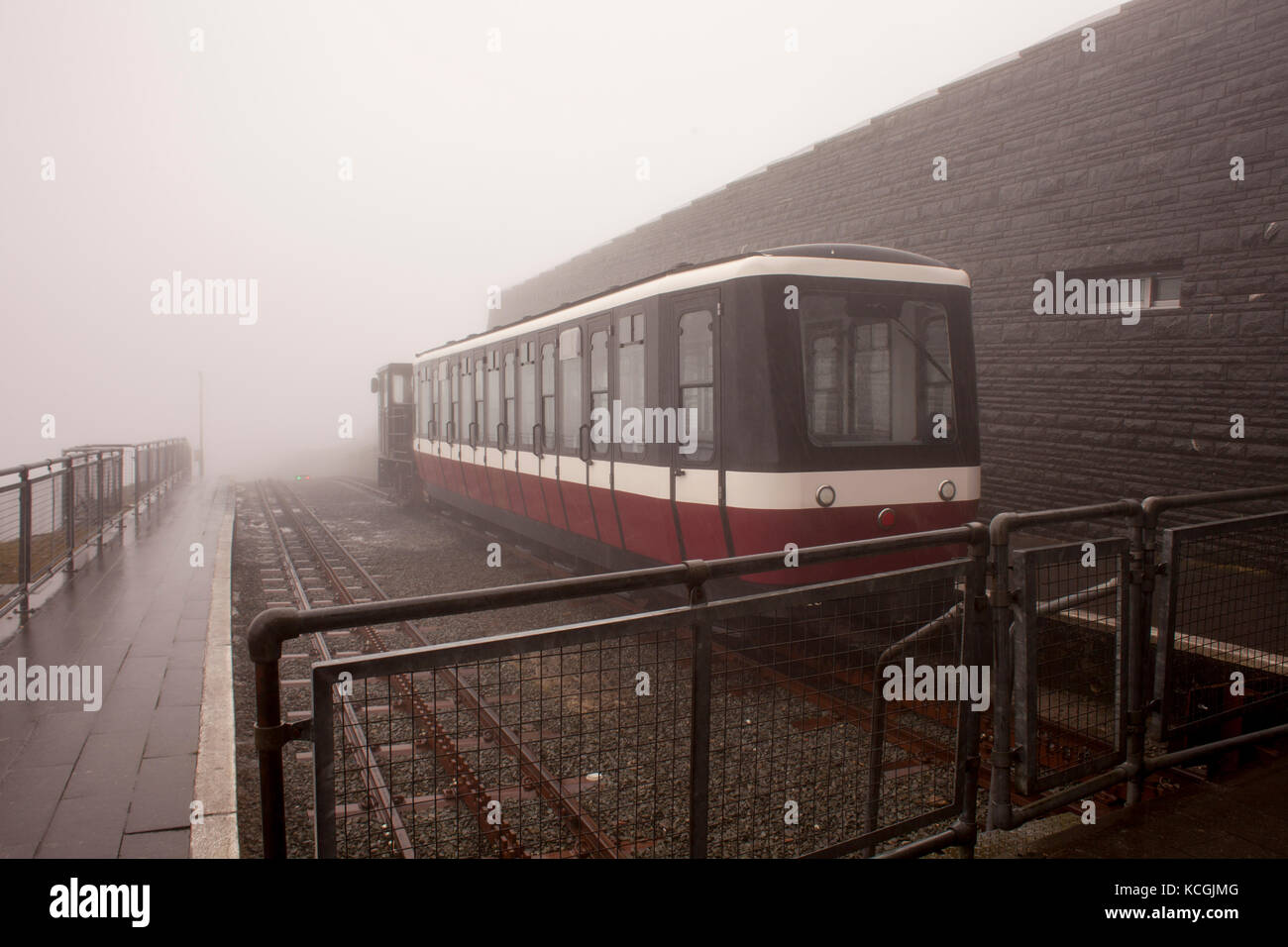 Retro steam train departs from the railway station in the UK snowdon ...