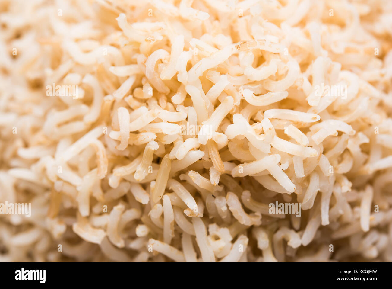 Stock photo of Indian brown wholegrain basmati cooked rice and raw rice ...