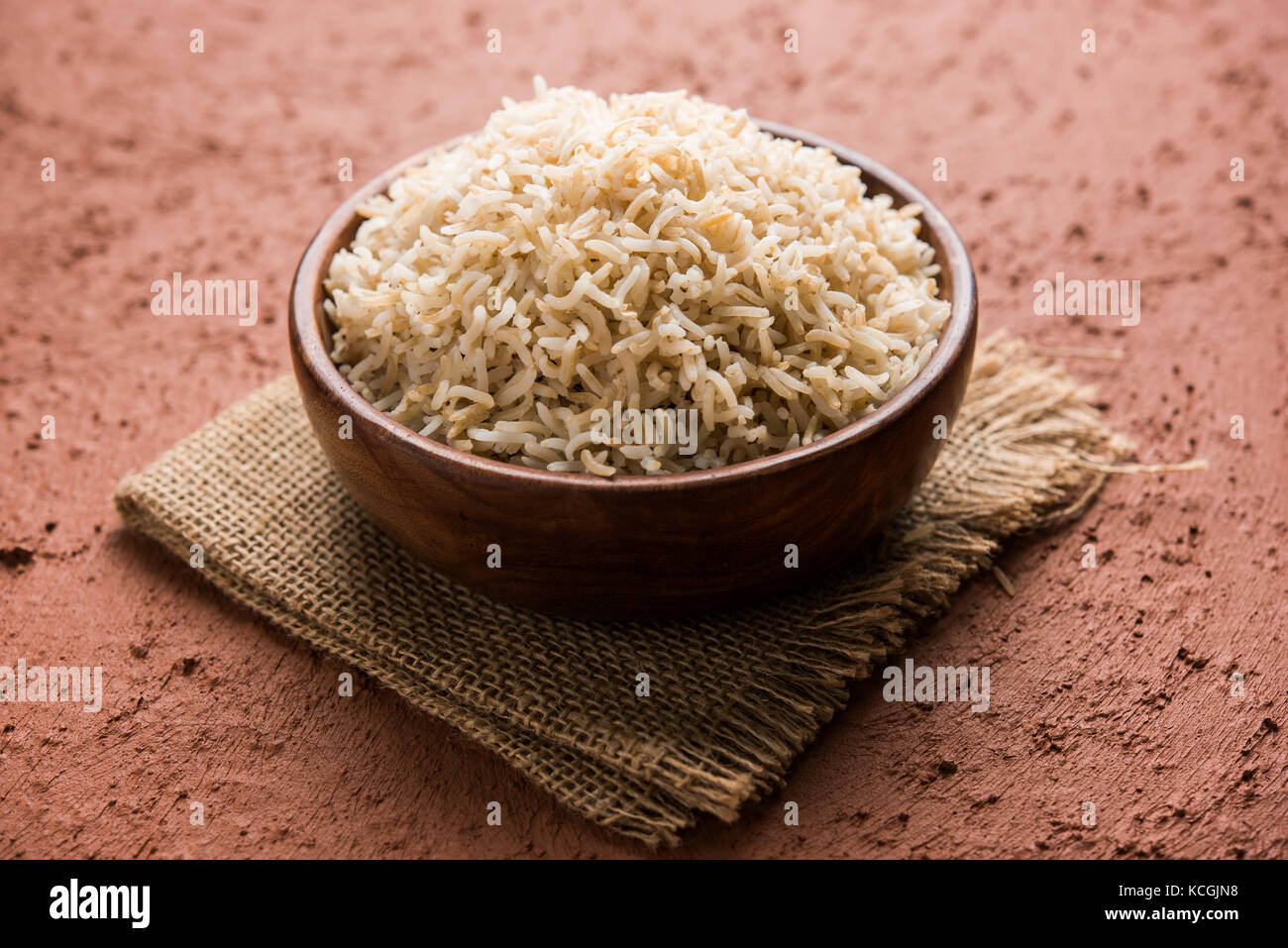 Stock photo of Indian brown wholegrain basmati cooked rice and raw rice ...