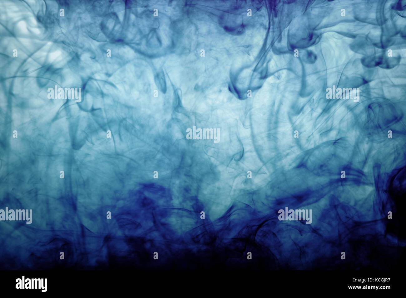 Abstract background made out of blue ink in water Stock Photo - Alamy