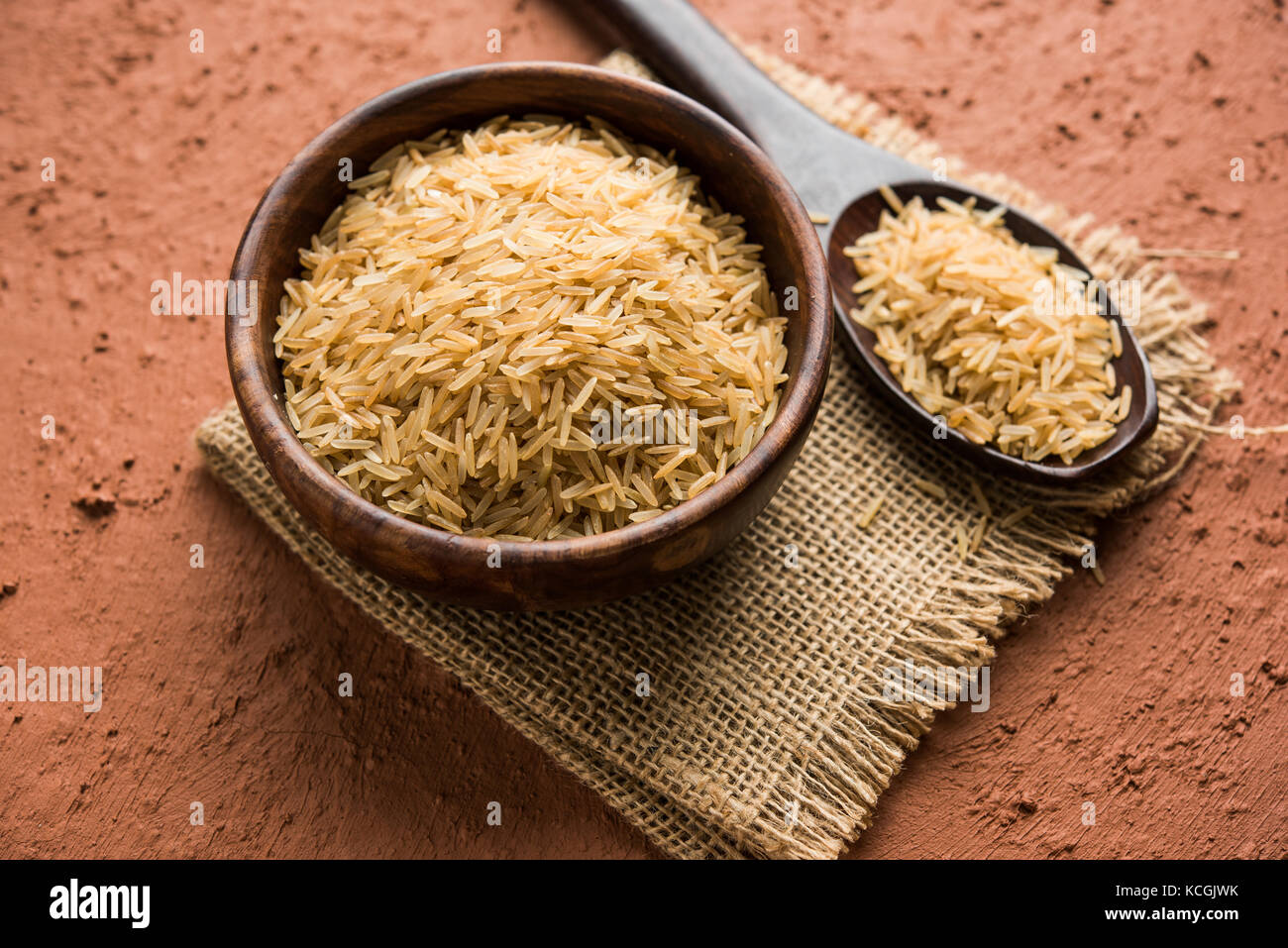 Stock photo of Indian brown wholegrain basmati cooked rice and raw rice ...