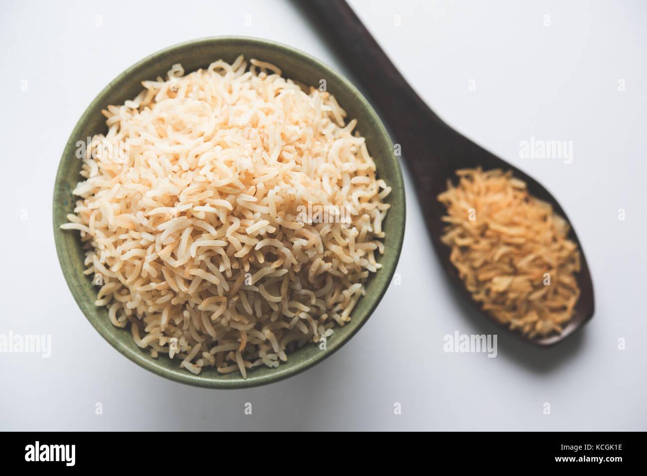 Stock photo of Indian brown wholegrain basmati cooked rice and raw rice ...