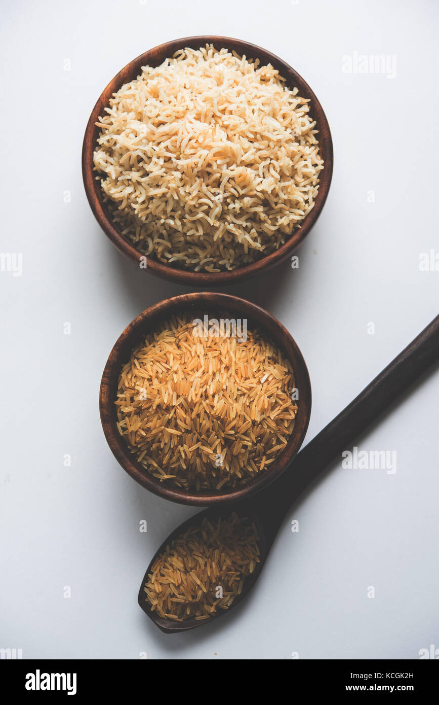 Stock photo of Indian brown wholegrain basmati cooked rice and raw rice ...