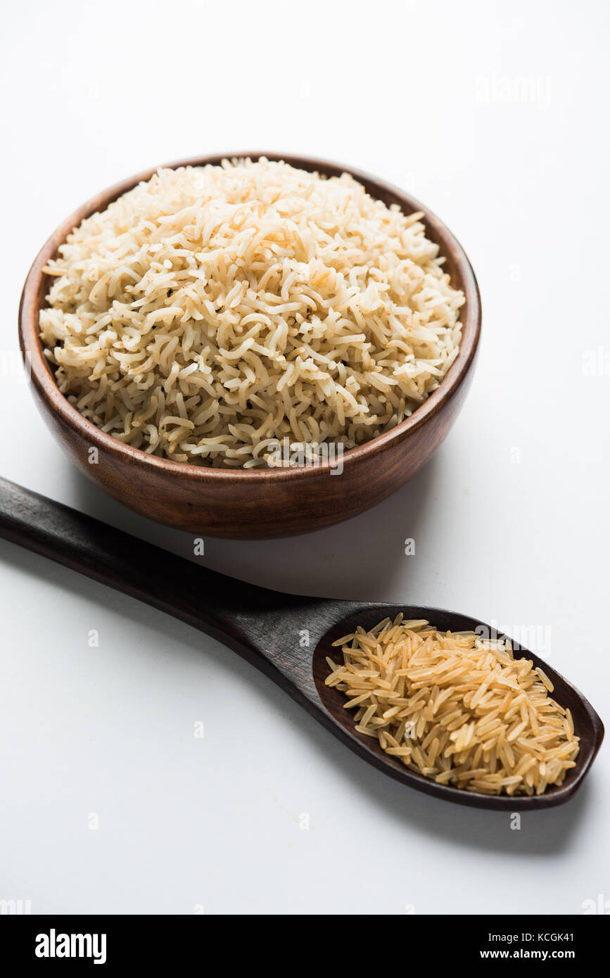 Stock photo of Indian brown wholegrain basmati cooked rice and raw rice ...