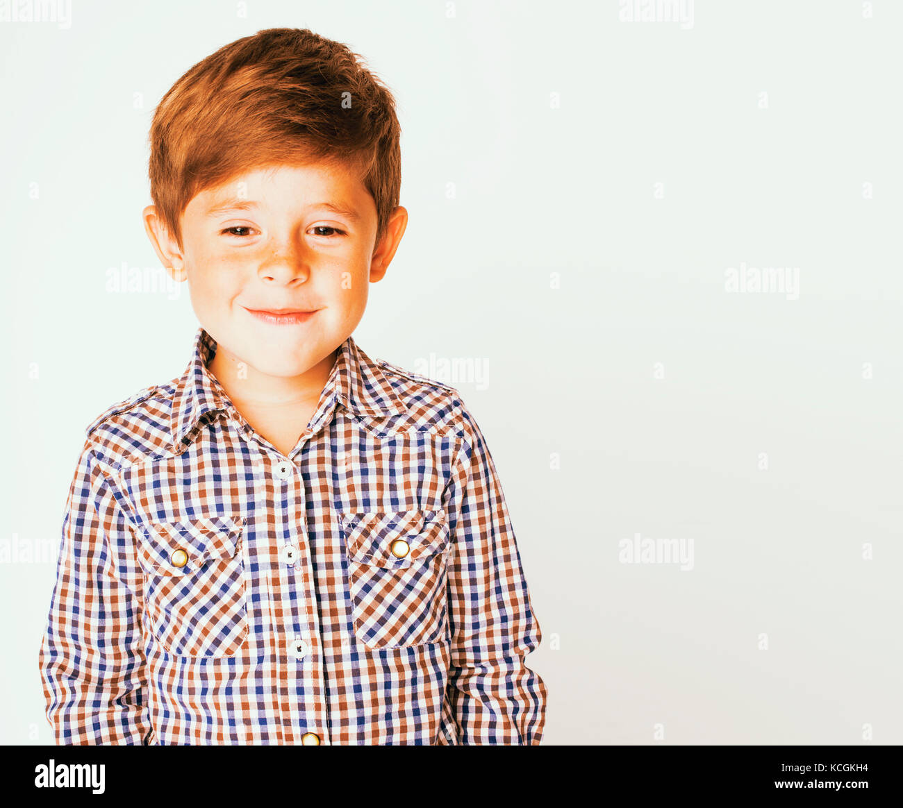 young pretty little cute boy kid wondering, posing emotional face ...