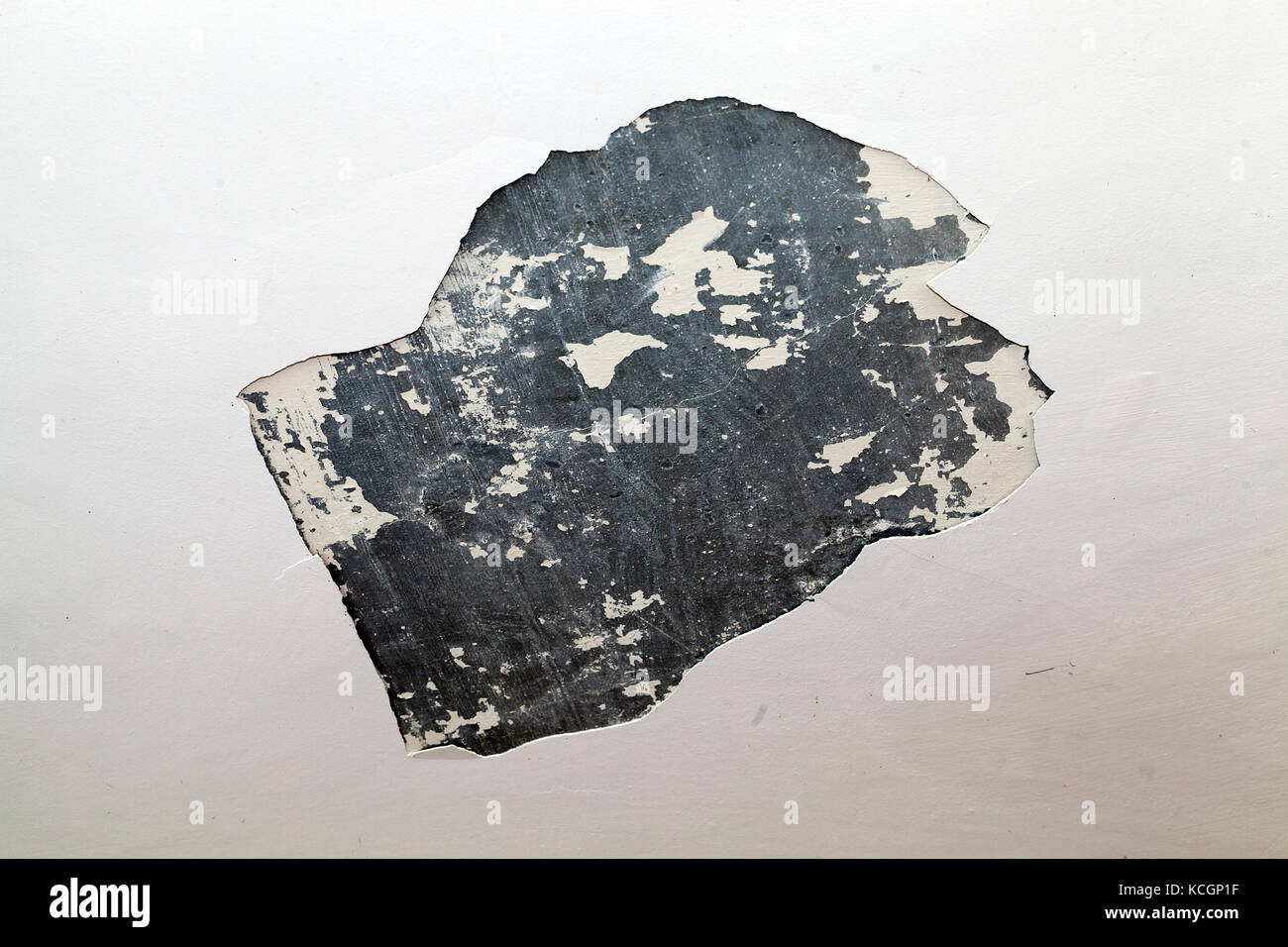 photographed close-up of a broken plaster on the wall of a building ...