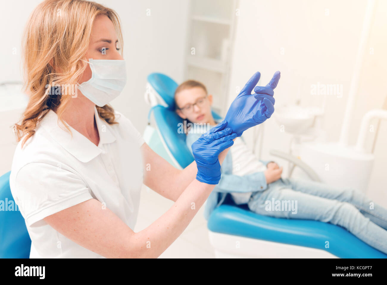 Female stomatologist preparing for treating her patient teeth Stock ...