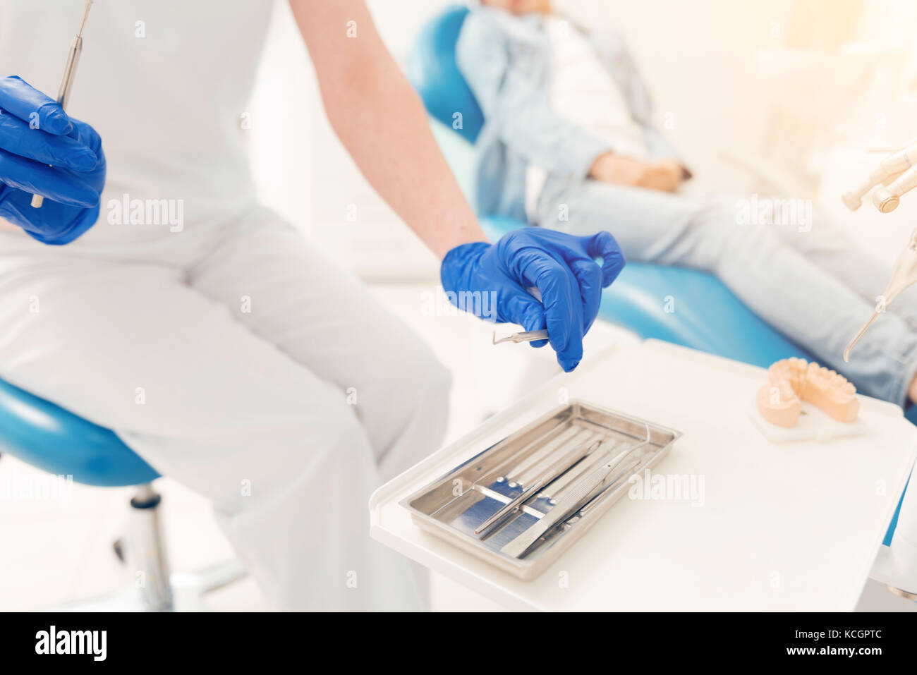 Close up of medical worker taking dental instruments Stock Photo - Alamy