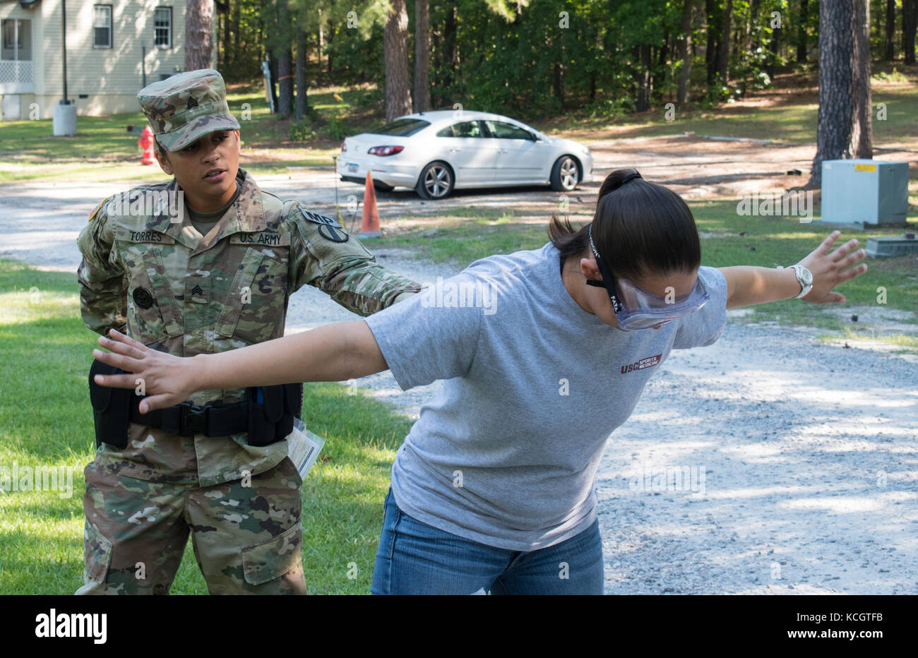 U.S. Army Sgt. Liannette Torres practices encountering a driver under ...
