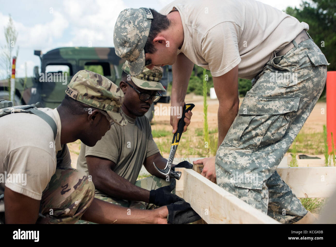 Soldiers construct a flooring system as part of their MOS specific ...