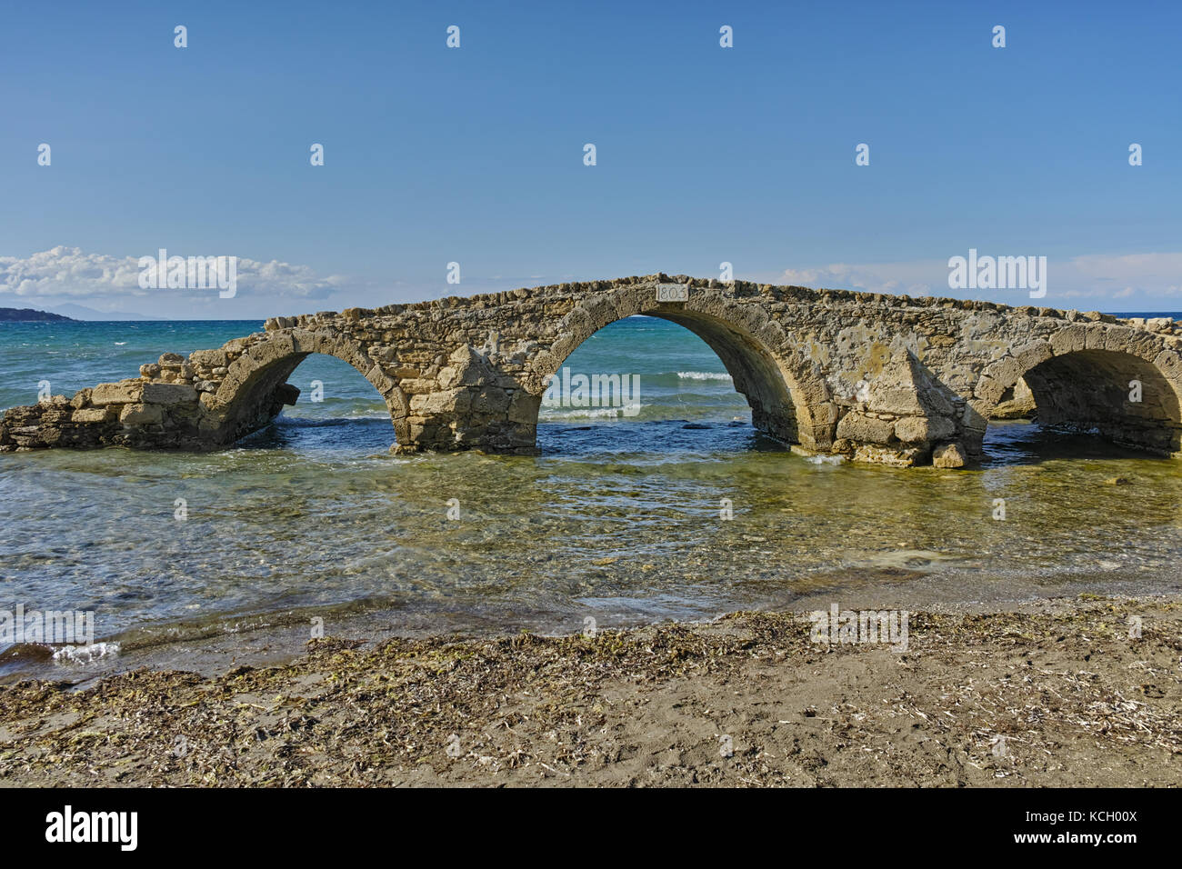 medieval bridge in the water at Argassi beach, Zakynthos island, Greece ...
