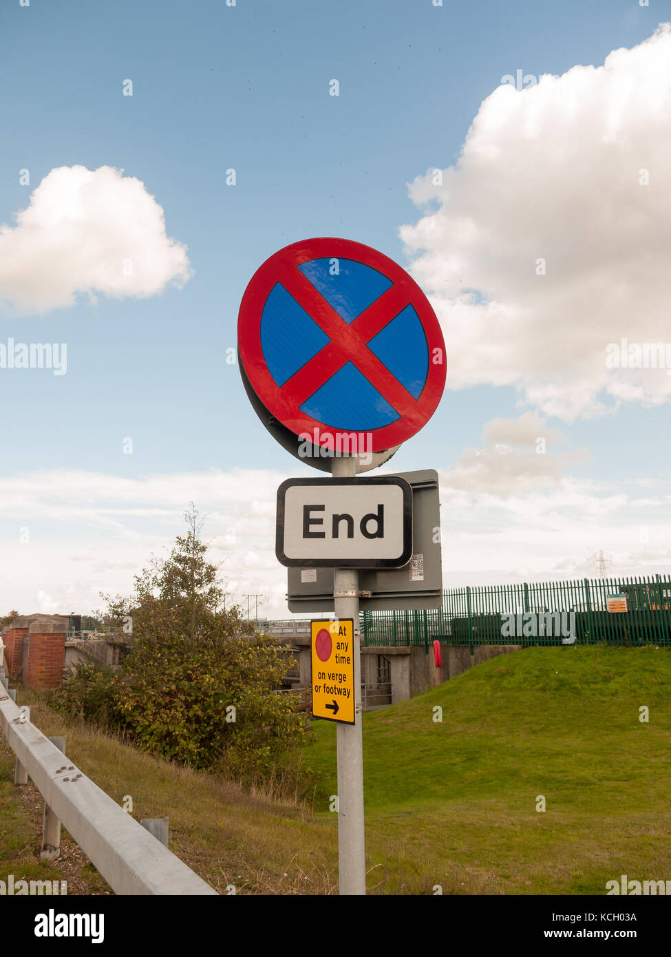 red circle cross and blue road sign saying end on post; Essex; England ...