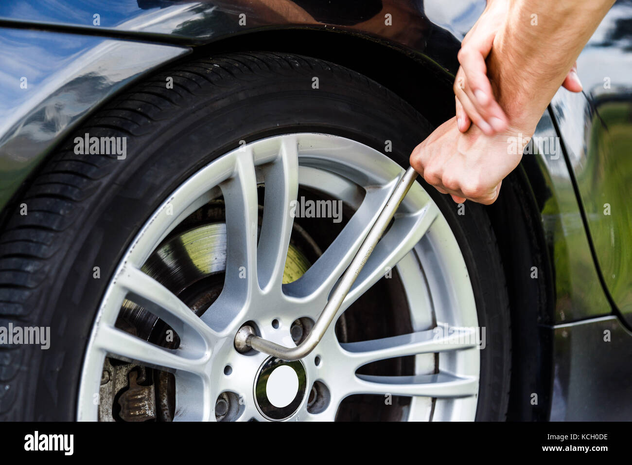 Car wheel with tyre wrench hi-res stock photography and images - Alamy