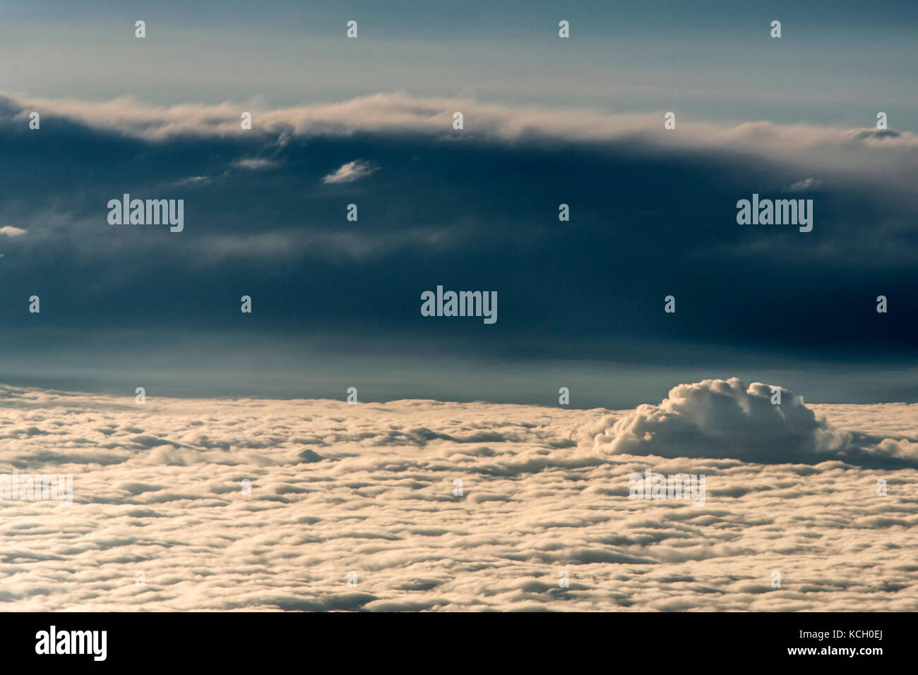 Clouds divided sky during sunset colorful light against dark contrasts ...