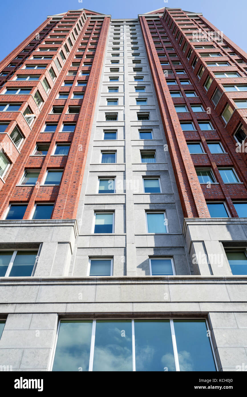 residential apartment tower against blue sky Stock Photo - Alamy