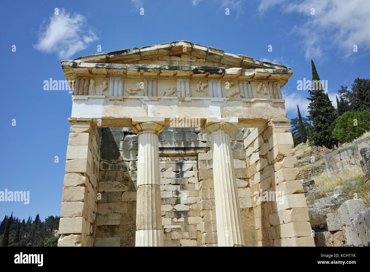 Building of Treasury of Athens in Ancient Greek archaeological site of ...