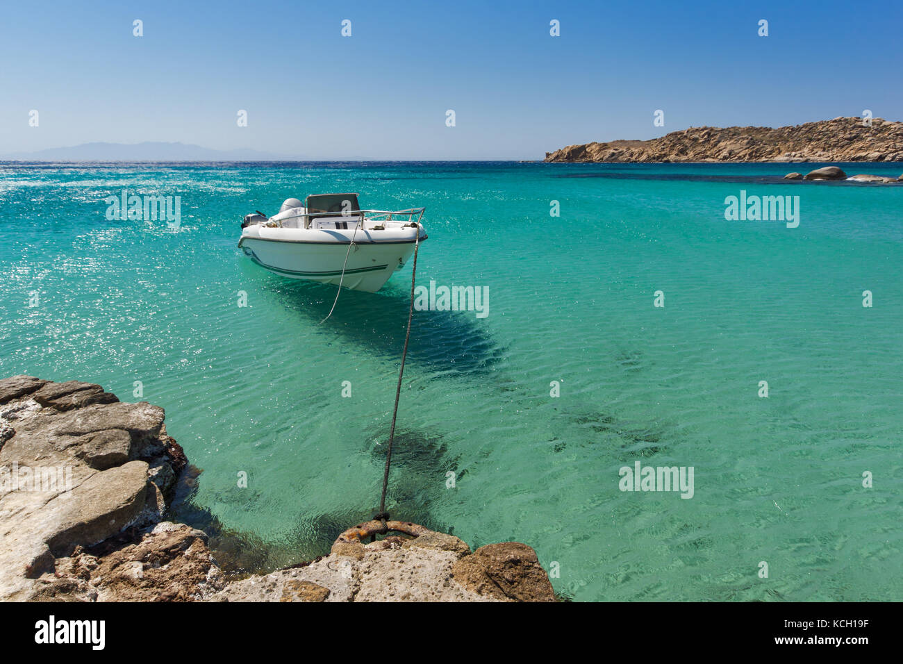 Small boat in Paranga Beach on the island of Mykonos, Cyclades, Greece ...