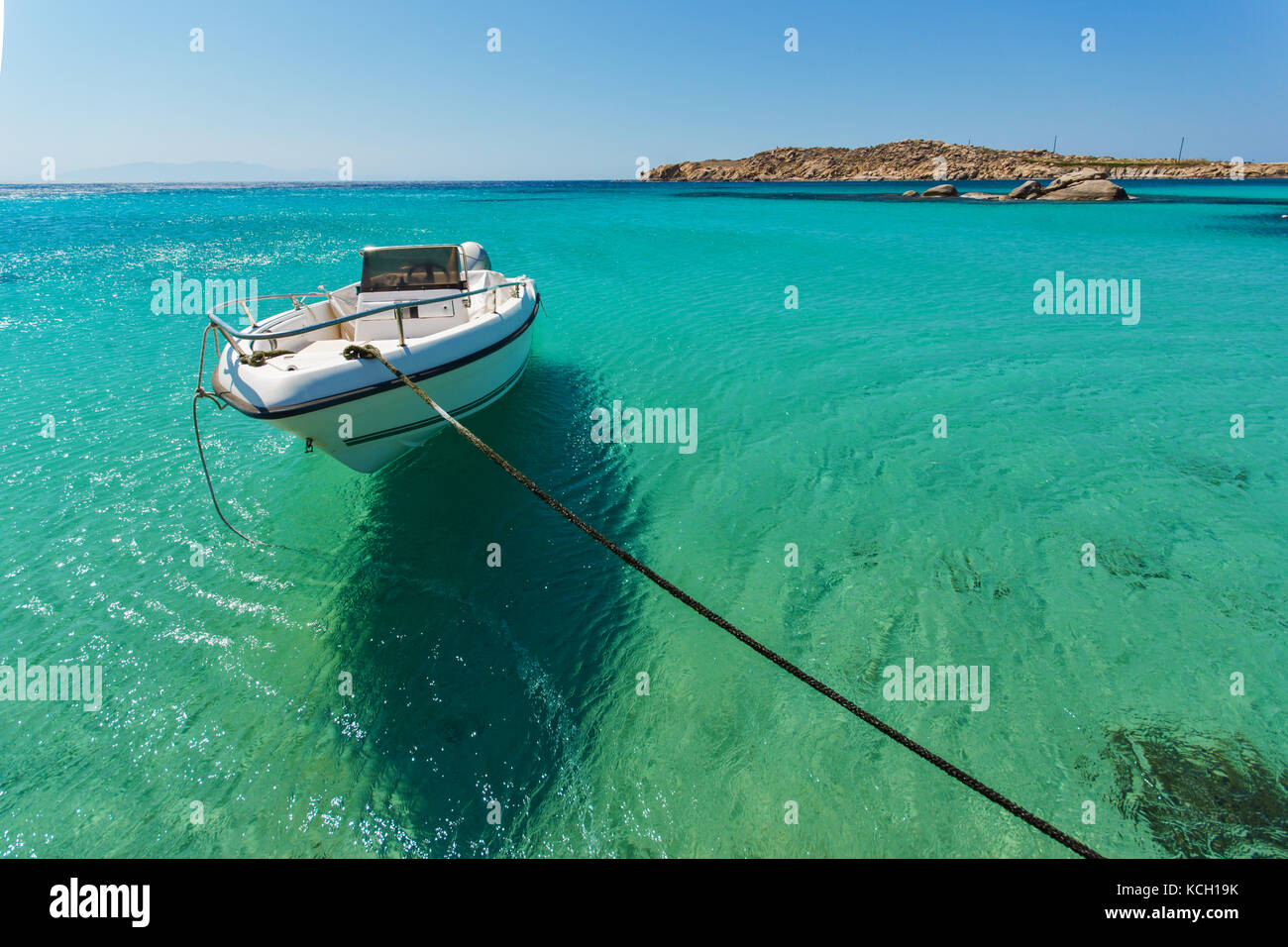 Small boat in Paranga Beach on the island of Mykonos, Cyclades, Greece ...
