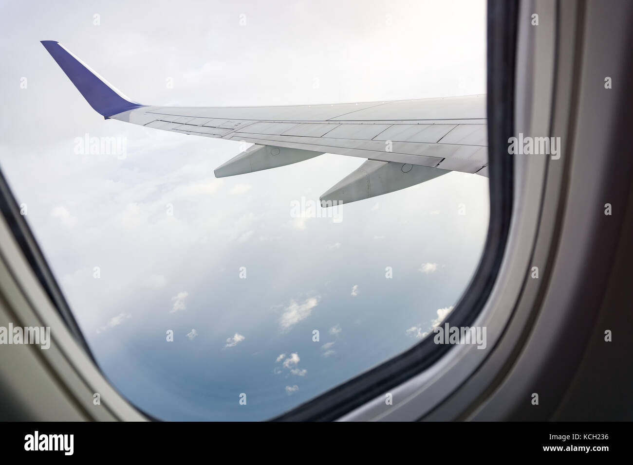 Airplane's wing viewed from window Stock Photo - Alamy