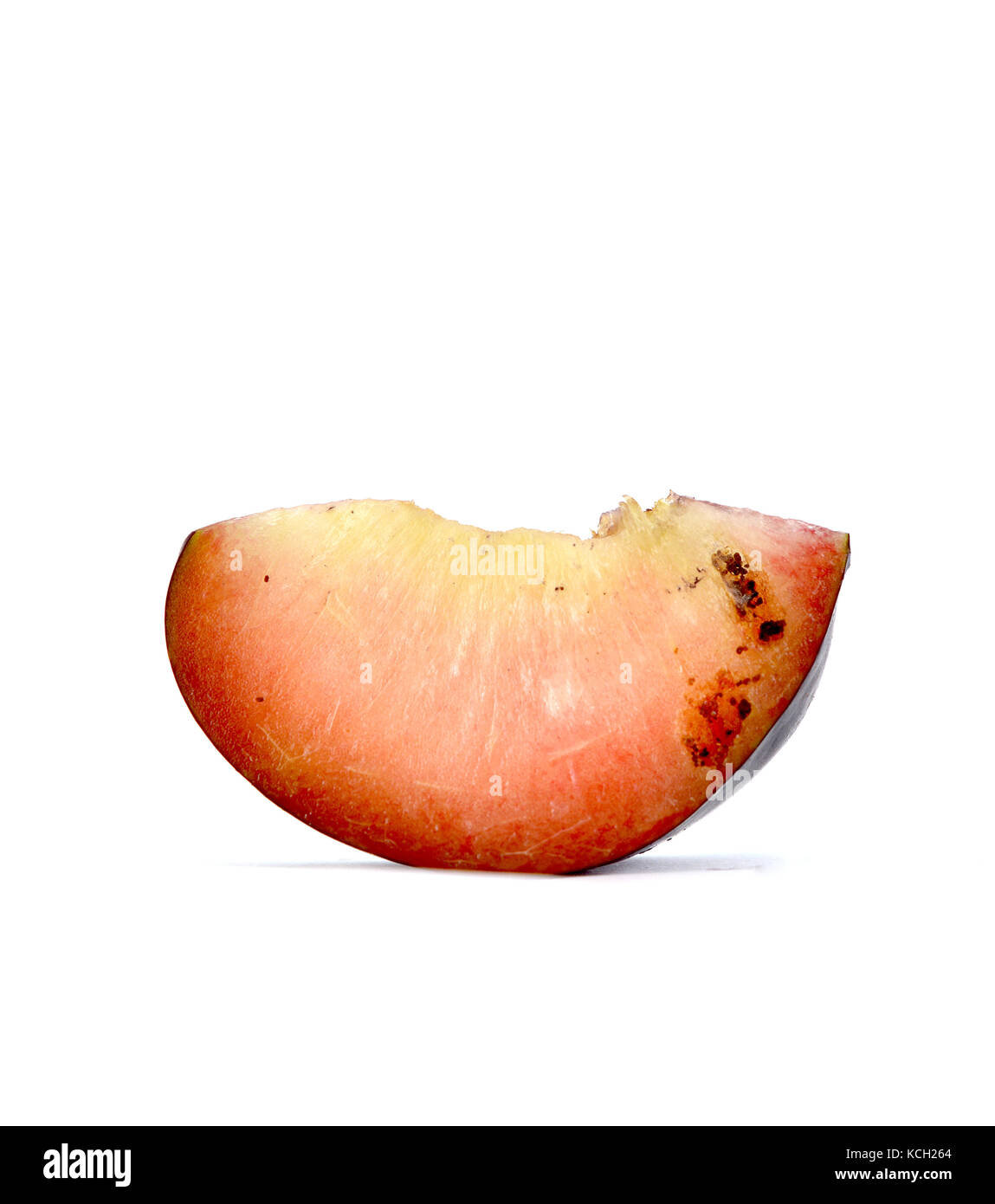 Plum slice with larva ,rottening fruit,image of a Stock Photo - Alamy