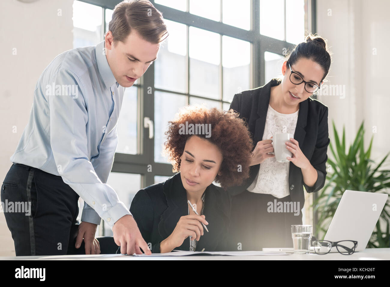 Man employee asking colleague help hi-res stock photography and images ...