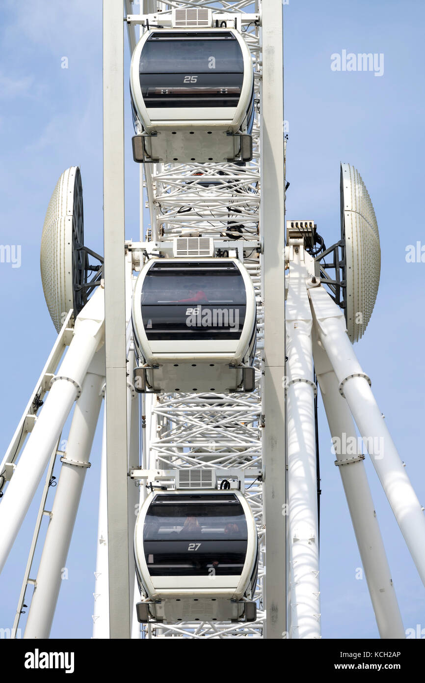 Ferris wheel against blue sky Stock Photo - Alamy